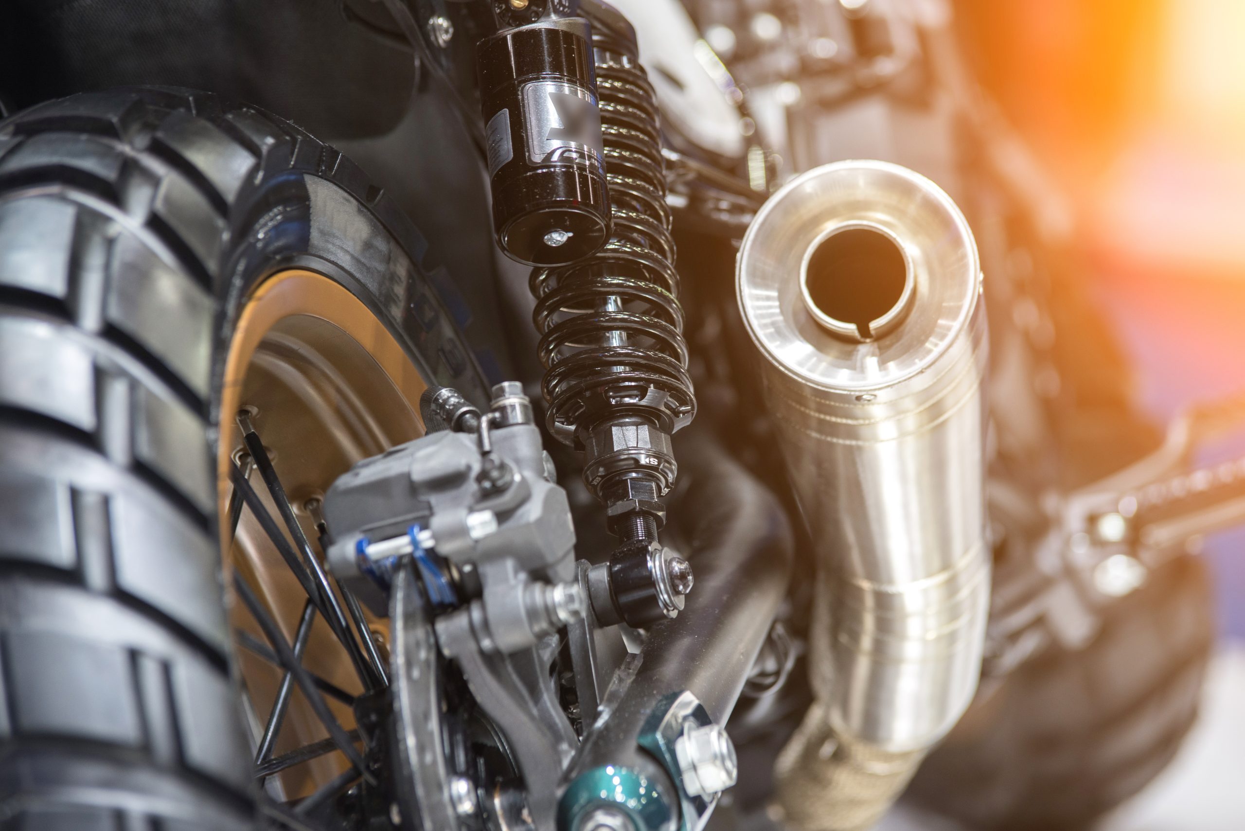 Close up shot of a motorcycle exhaust pipes. | HY GARAGE